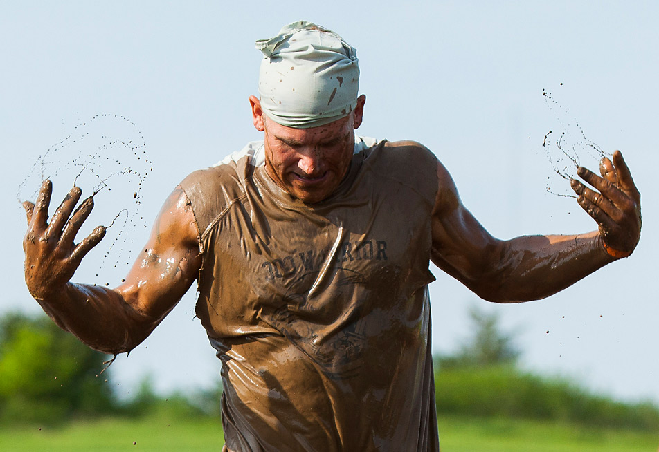 Photos: Mud, electric shocks and more test athletes in Tough Mudder ...