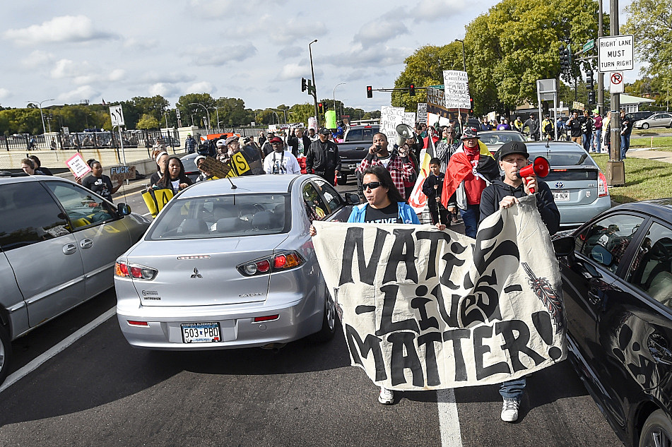 Black Lives Matter holds peaceful protest at marathon | Minnesota ...